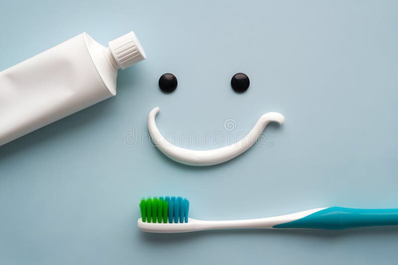 A Toothpaste Smiley Face with a Toothbrush and Toothpaste Tube Stock ...