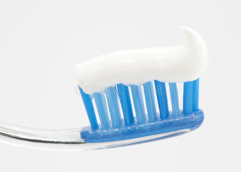 Toothpaste on toothbrush stock photo. Image of teeth - 17279514