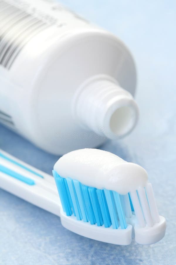Toothpaste and toothbrush stock photo. Image of grooming - 5843784