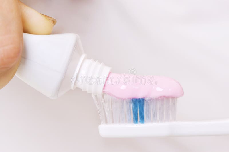 Toothpaste on toothbrush stock image. Image of morning - 7056949