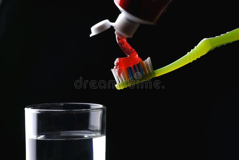Toothpaste, Toothbrush and a Glass of Water Stock Photo - Image of ...