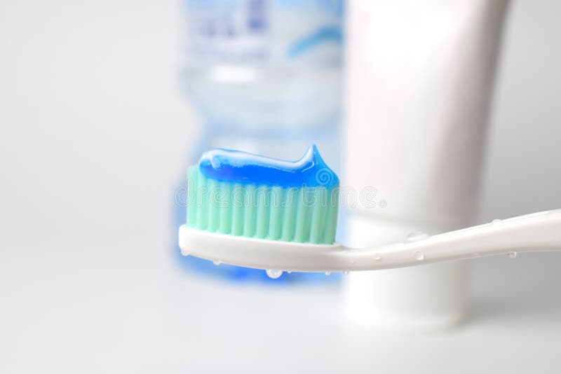 Toothpaste on a Toothbrush with Water Drop Stock Image - Image of water ...
