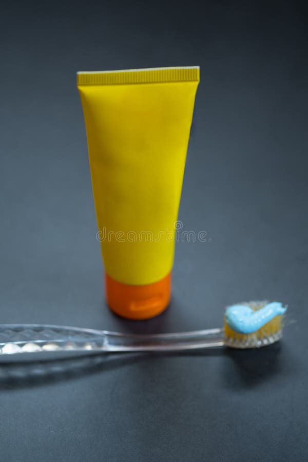 Toothpaste Tube with Toothbrush Stock Image - Image of plastic, bristle ...