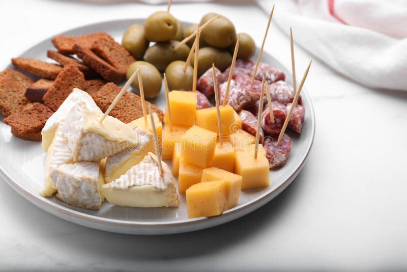 Toothpick Appetizers. Pieces of Different Cheese, Sausage and Olives on ...