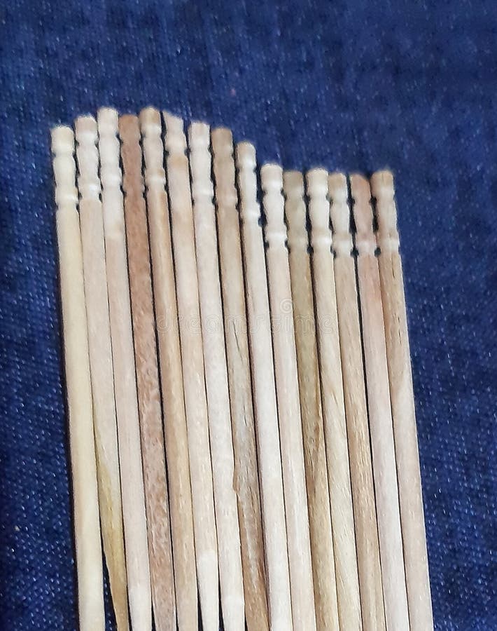 Toothpicks Placed on a Dark Blue Surface Stock Photo - Image of ...