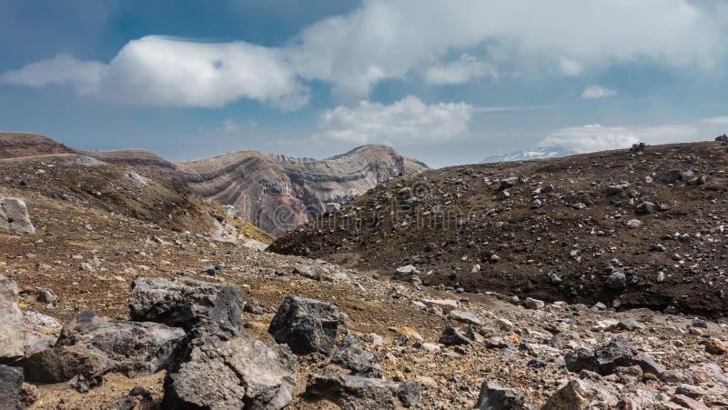 The Top of an Active Volcano. Rocky Soil is Visible Stock Photo - Image ...