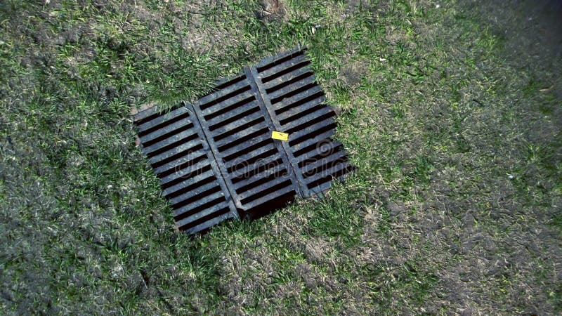 Top Aerial View on Dry Grass, Ground and Drain Sewer Grid in Earth ...