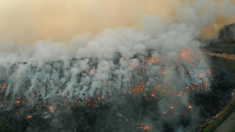 Top Aerial View at Fire at Garbage Dump, Burning Pollutes the ...