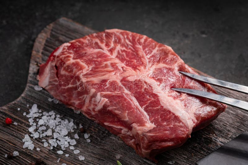 Top Blade Beef Shoulder Steak on a Wooden Stock Photo - Image of blade ...