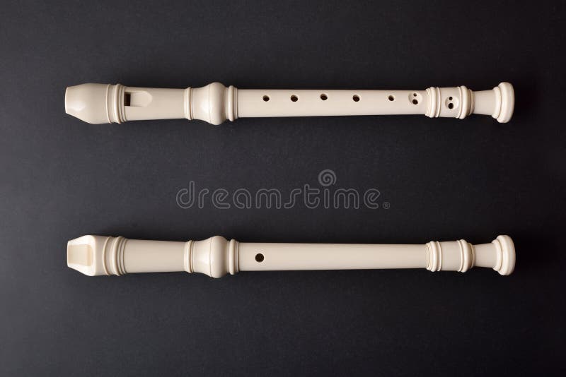 Top and Bottom View of White Recorder on Black Table Stock Photo ...
