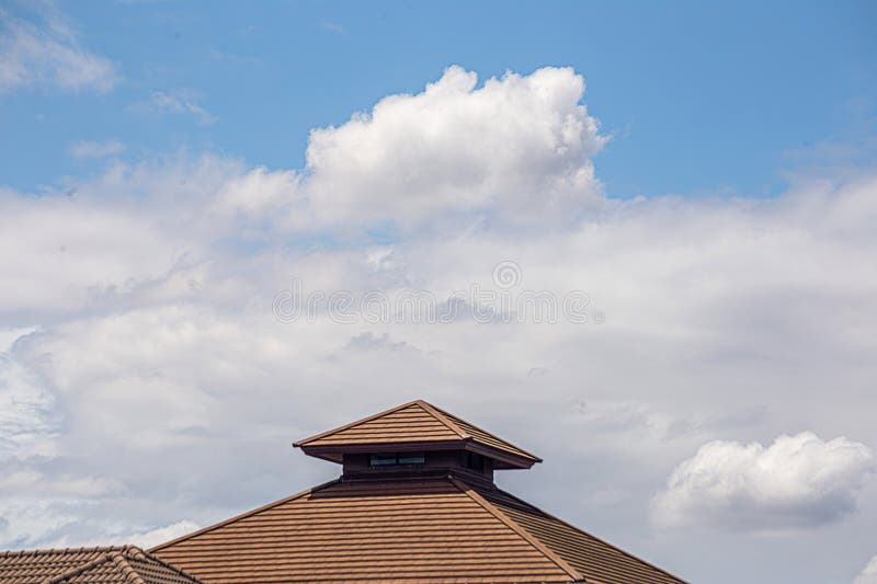 Top of Building on New House with Clear Blue Background Stock Photo ...