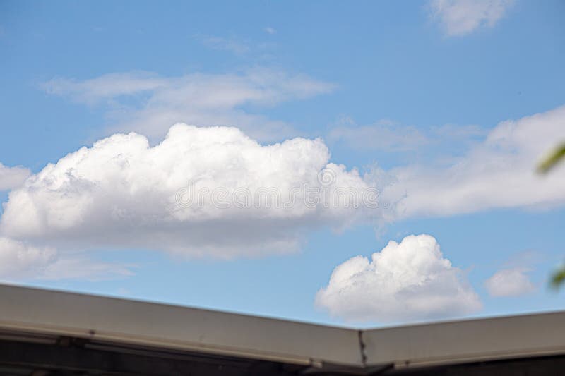 Top of Building on New House with Clear Blue Background Stock Photo ...