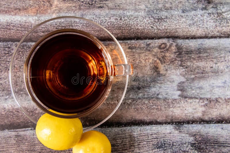 Top Close Up Shot of Black Tea,lemon on a Wooden Texture with Copy ...