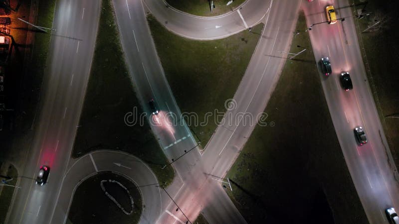 Top Down Aerial View of a Night Intersection with a Moving Traffic ...
