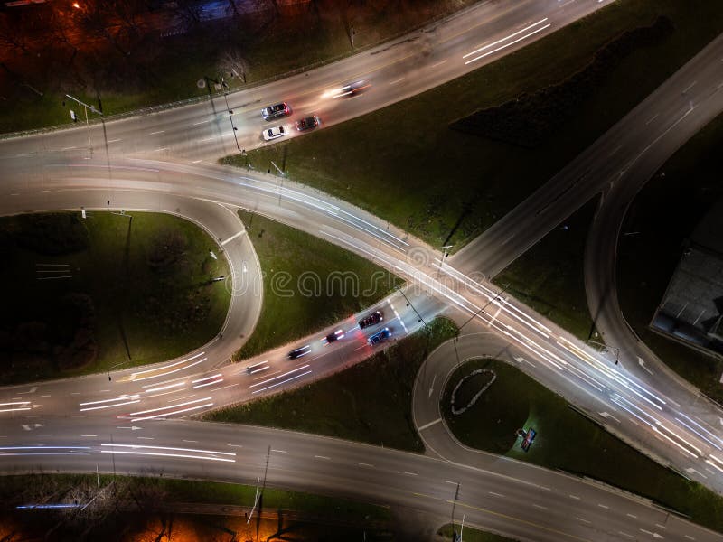 Top Down Aerial View of a Night Intersection with a Moving Traffic ...