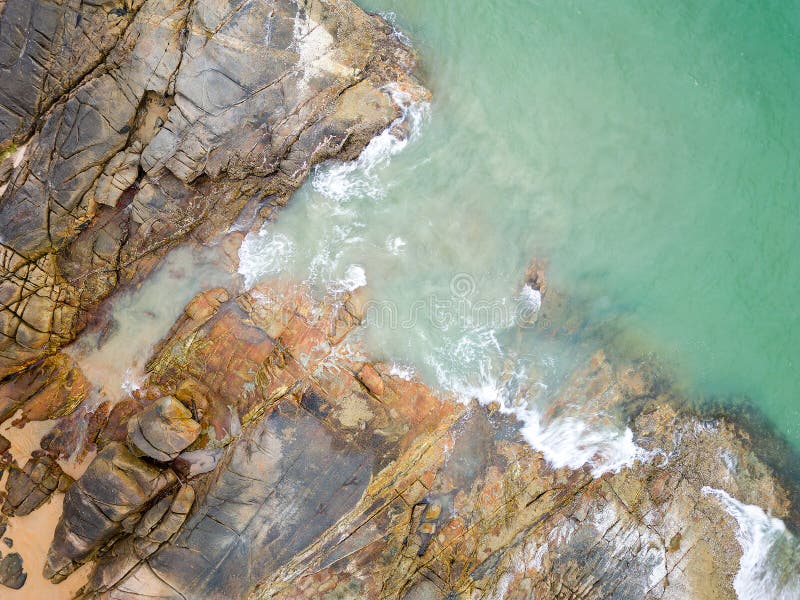 Top Down Aerial View of a Shallow Tropical Ocean and Rocks on the ...