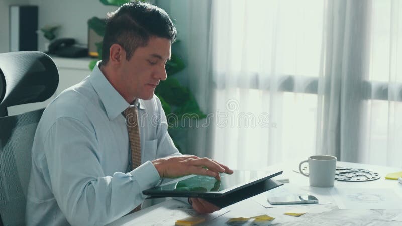 Top View of Smart Engineer Look at Document about Turbine Engine ...