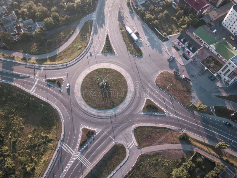 Top Down Aerial View of a Traffic Roundabout on a Main Road Stock Photo ...