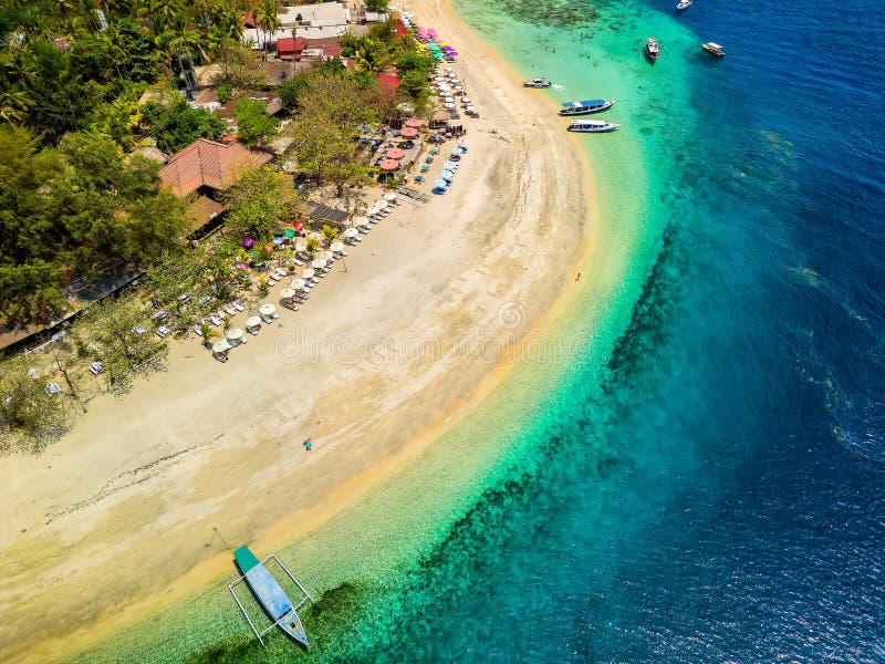 Top Down Aerial View of a Tropical Beach and Resorts on a Small Island ...