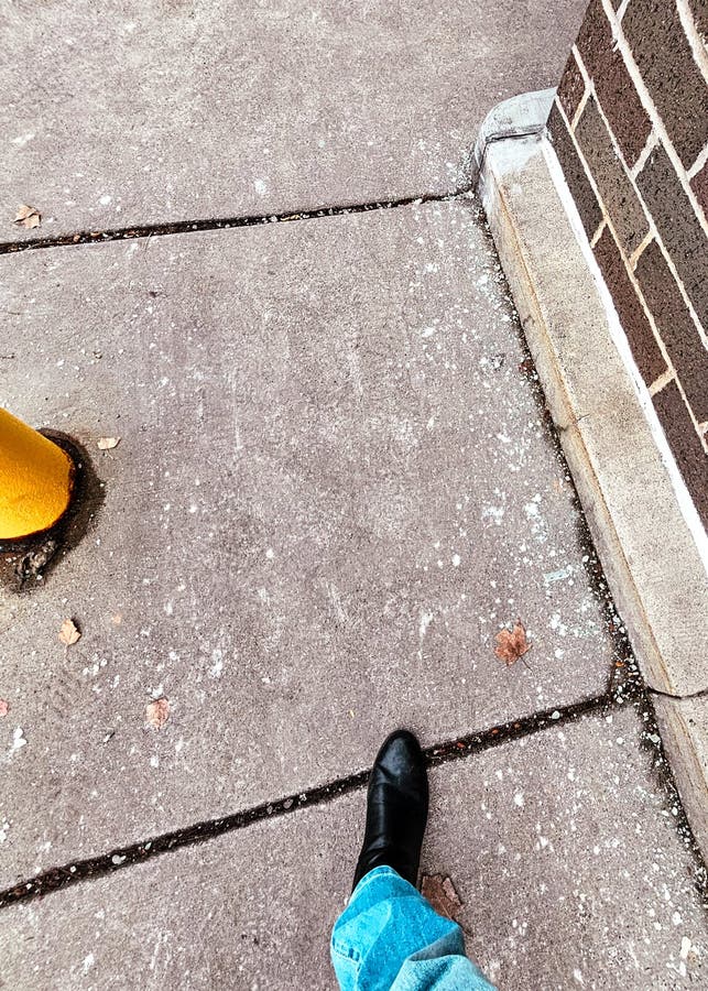 Top Down Vertical Perspective of Person Walking Boot Sidewalk Along ...