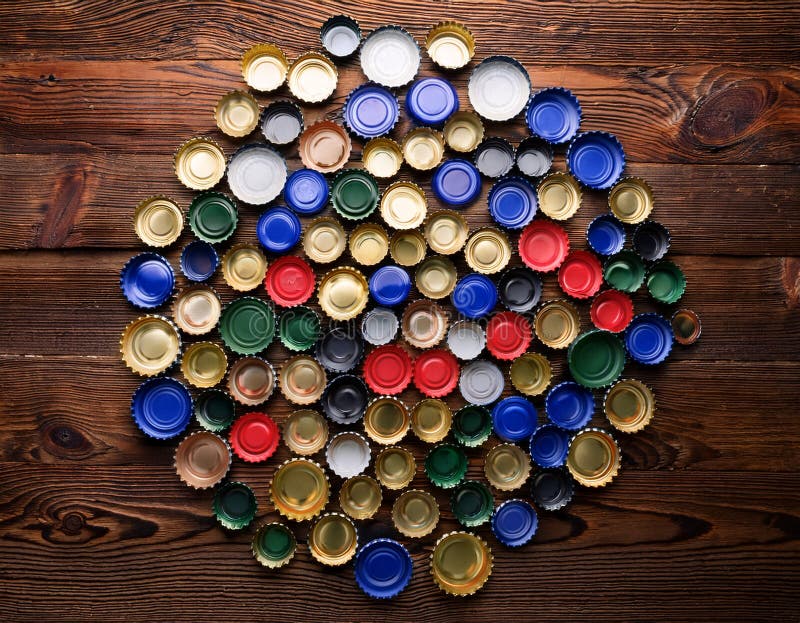A Top-down View of Assorted Beer Caps Creating a Colorful Mosaic-like ...