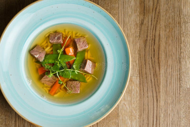 Top Down View of Beef Soup in a Plate on a Wooden Table Stock Image ...