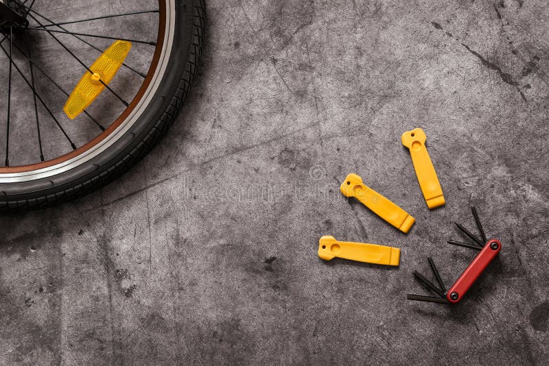 Top Down View of a Bike Wheel and Tools for Repairing. Stock Photo ...