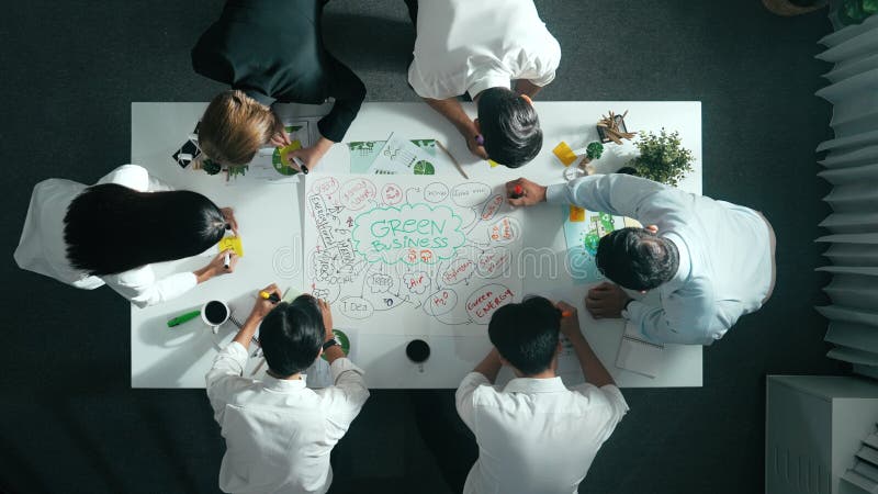 Top Down View of Business Team Discuss about Using Clean Energy ...