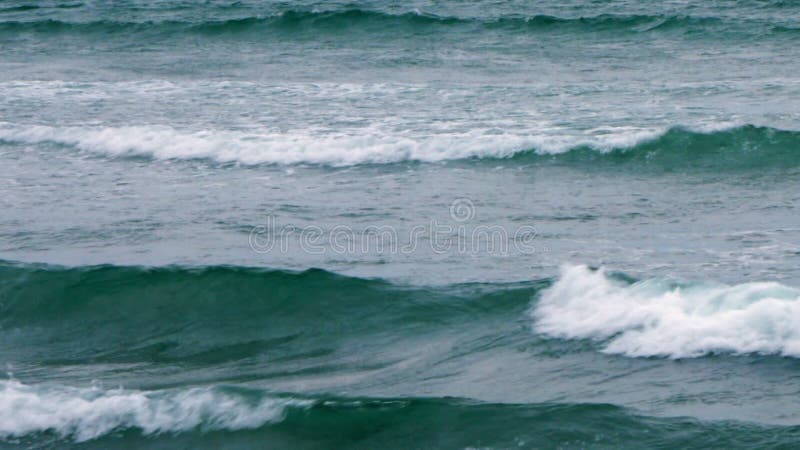 A Top-down View of a Calm Ocean Surface. Several Parallel Lines of ...