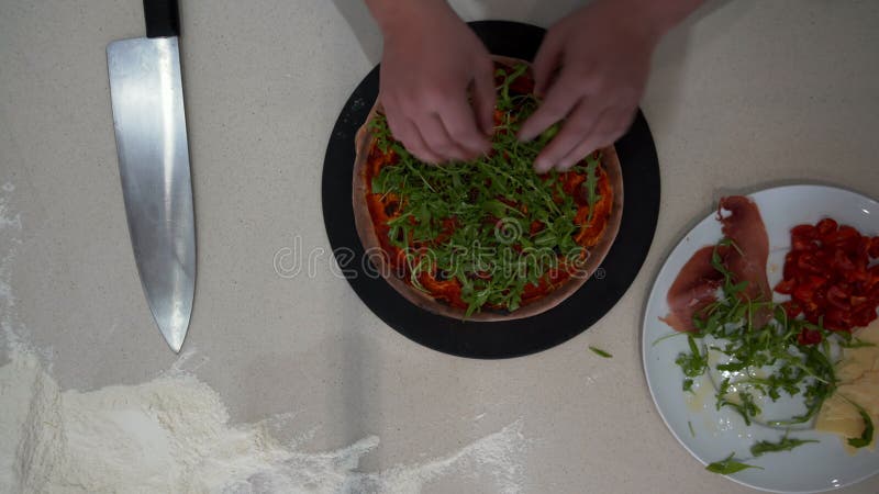 Top Down View of a Chef Making Pizza with Various Condiments. Overhead ...