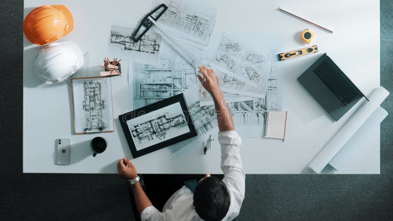 Top View of Engineer Plan Construction and Looking at Blueprint ...