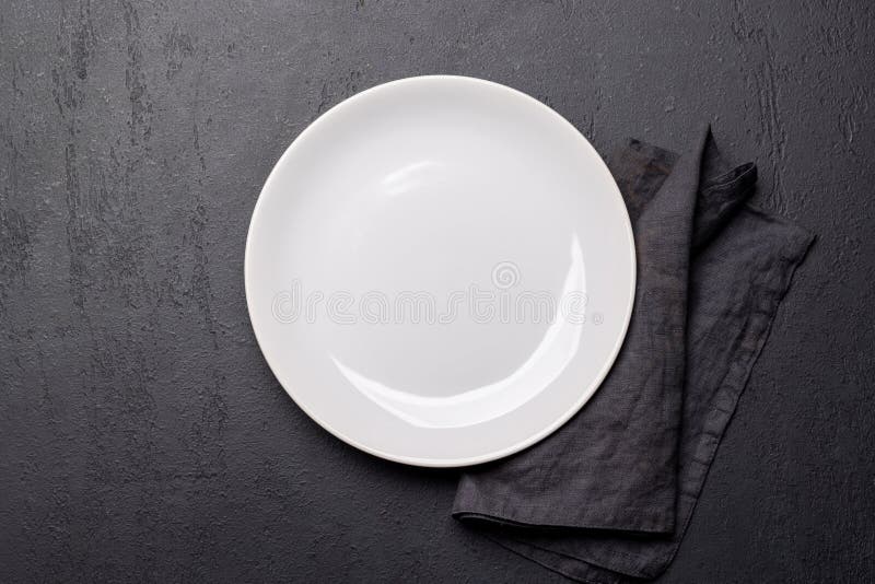 Top-down View of an Empty Plate and Silverware Mockup Stock Photo ...
