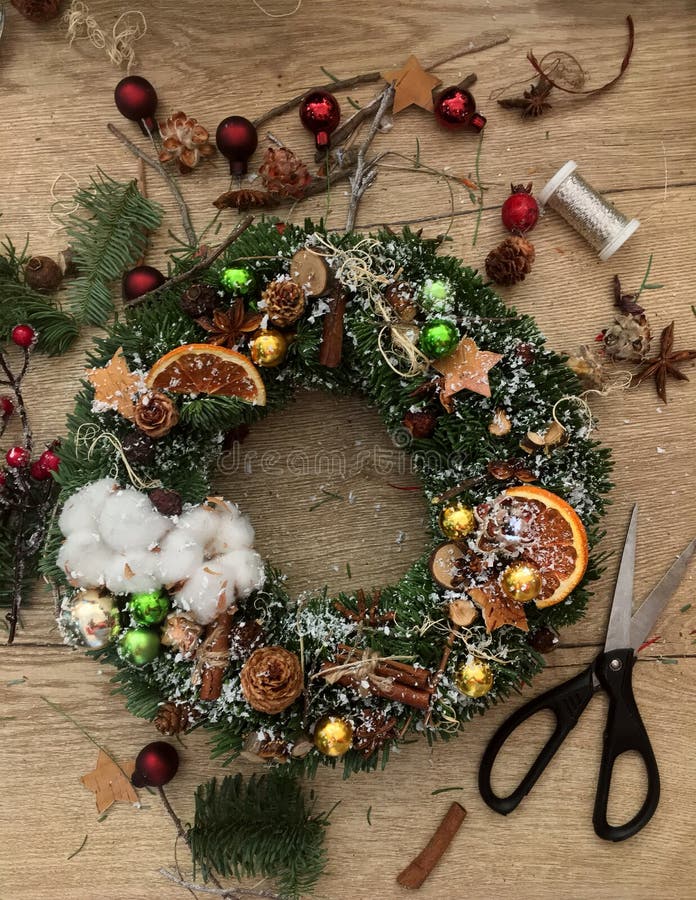 Making of Christmas Wreath. Christmas Wreath on Wooden Table Top View ...