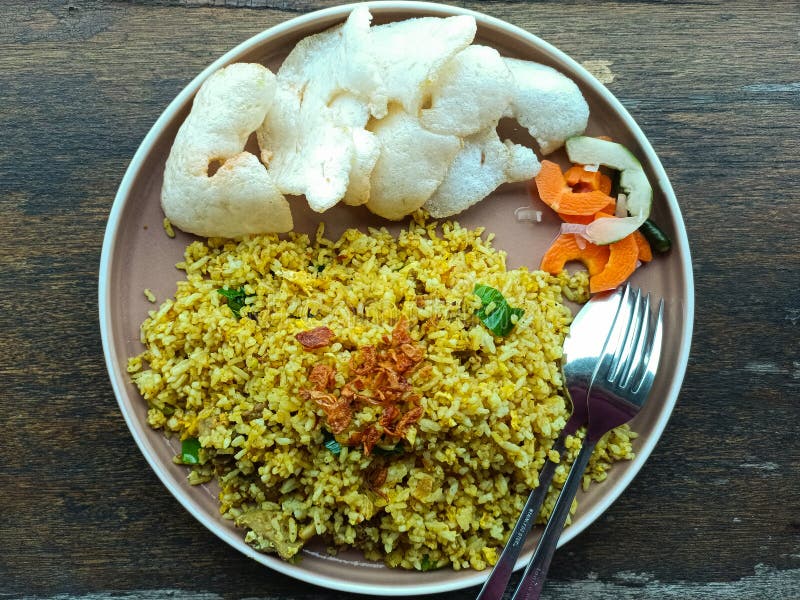 Top Down View of Fried Rice Plate with Crackers and Pickles Stock Photo ...