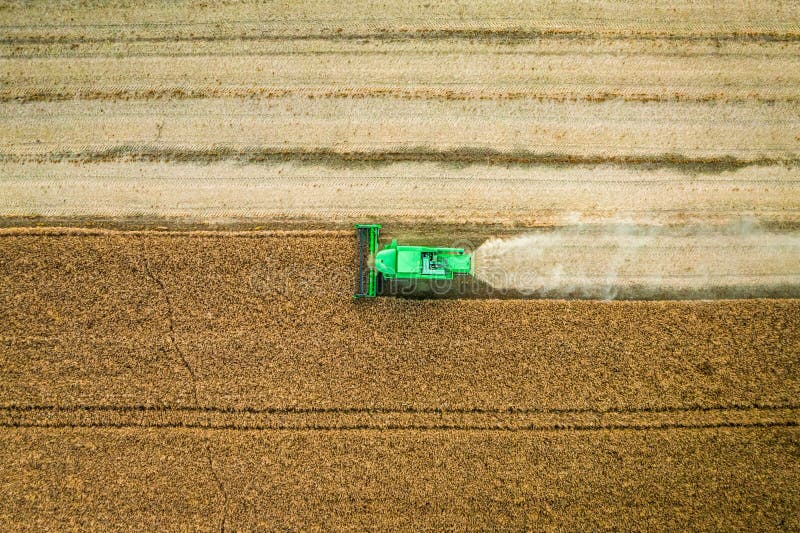 Top Down View of Harvester Working on Field, Aerial View Stock Photo ...