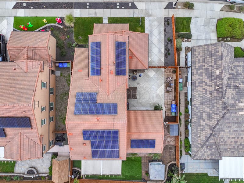 Top Down View of a House with Multiple Solar Panels on Top Stock Photo ...