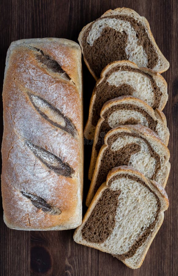 Top Down View of a Loaf of Marble Rye Unsliced with Slices of Marble ...