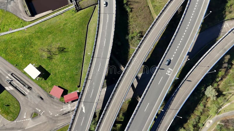 Top-down View of Multilane Highway Intersection and Green Landscape ...