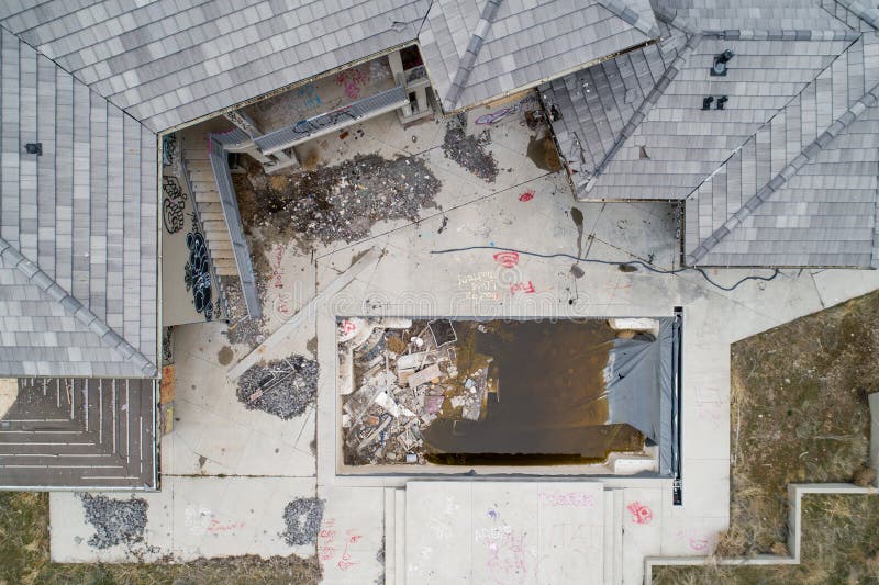 Aerial View of Abandoned Building with Graffiti and Debris Stock Photo ...