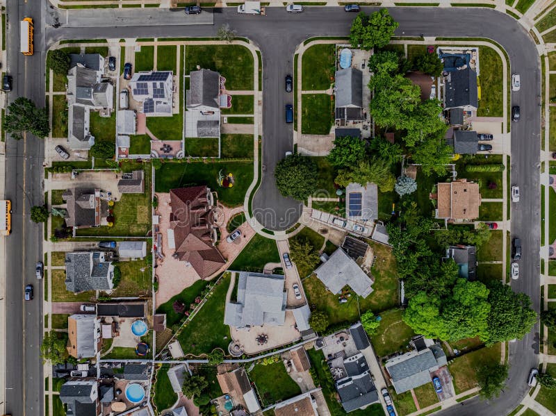 Top-down View Over a Middle-class Residential Neighborhood on a Cloudy ...