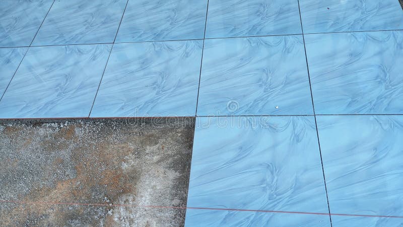 A Top-down View of a Partially Completed Floor Tiling Project. the ...