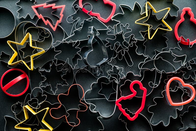 Top Down View of a Pile of Cookie Cutters on a Dark Cookie Sheet. Stock ...