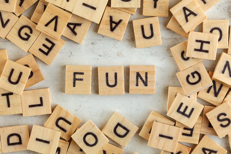 Top Down View, Pile of Square Wooden Blocks with Word FUN on White ...