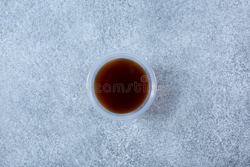Top Down Plastic Condiment Cup Brown Sauce Stock Image - Image of ...