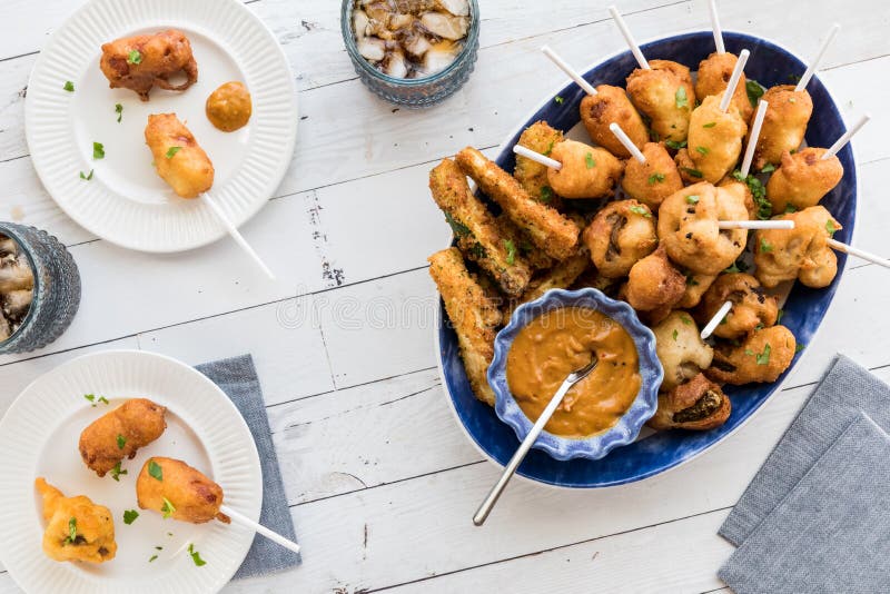 A Platter of Deep Fried Appetizers Served with Hot Mustard for Dipping ...