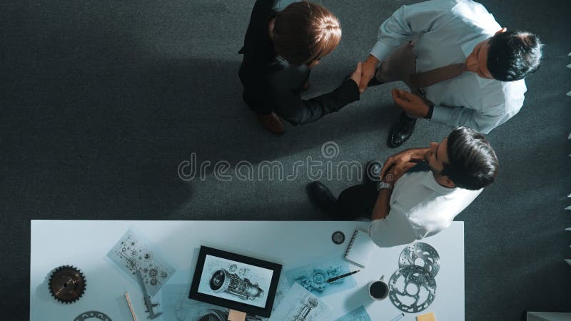 Top Down View of Professional Engineer Talking and Shaking Hand ...