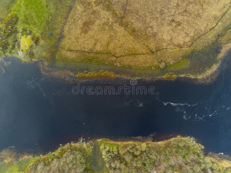 Top Down View on a River. Green Fields on Each Side of the River Stock ...