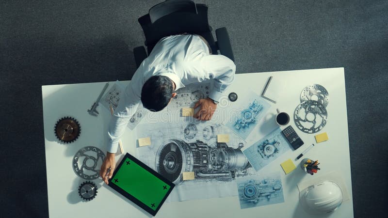 Top View of Skilled Engineer Writing and Planning Engine Design ...