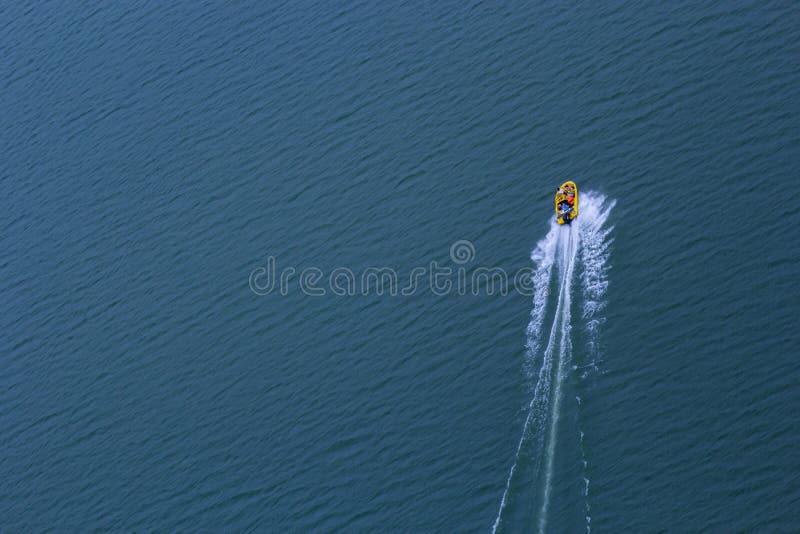 A Top-down View of the Speed of a Motorboat Sailing on Water Stock ...