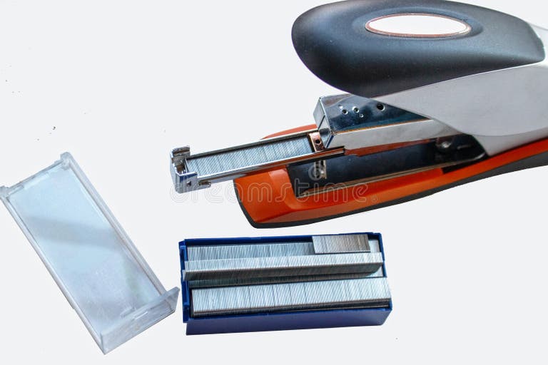 Top Down View of Stapler and Staple Refills on White Surface Stock ...